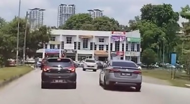 Polis cari pemandu Nissan Almera pandu berbahaya, langgar lampu isyarat ...
